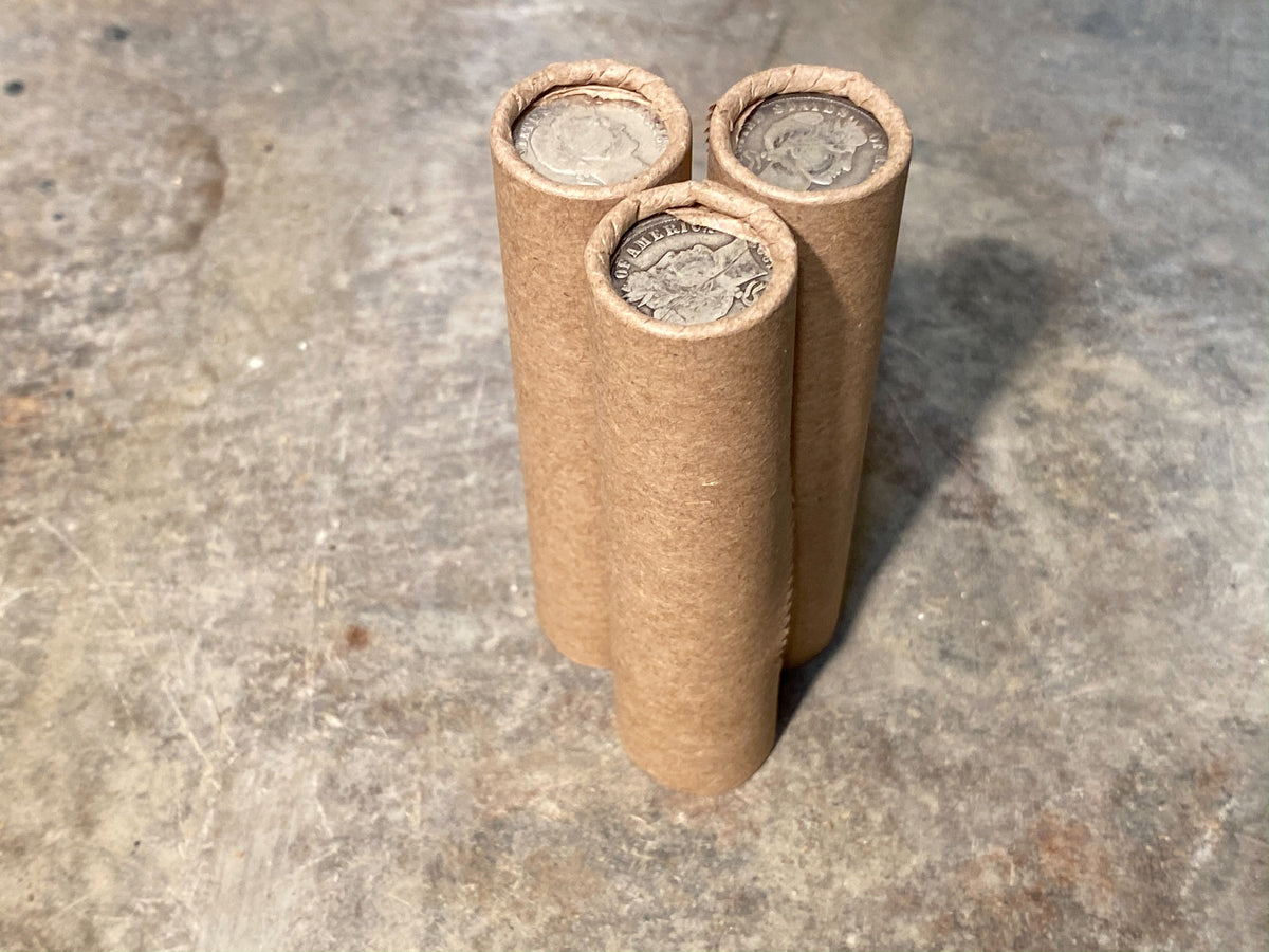 SILVER BARBER DIME showing on end of old brown vintage us wheat cent c ...